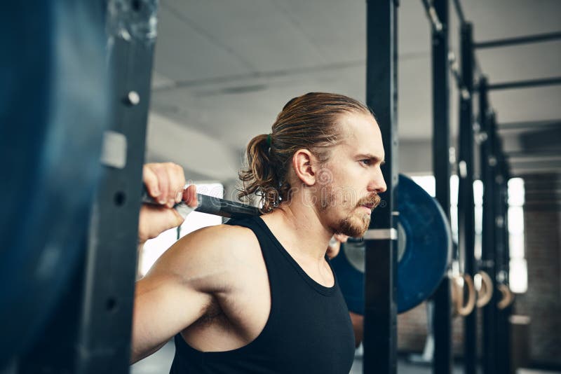 Dont Wait, Dont Hesitate, Lift Weights, Be Great. a Man Lifting Weights ...