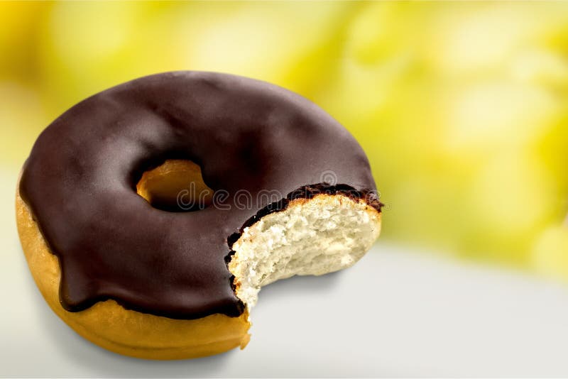Donut bite stock image. Image of eating, pastry, bite - 118933969