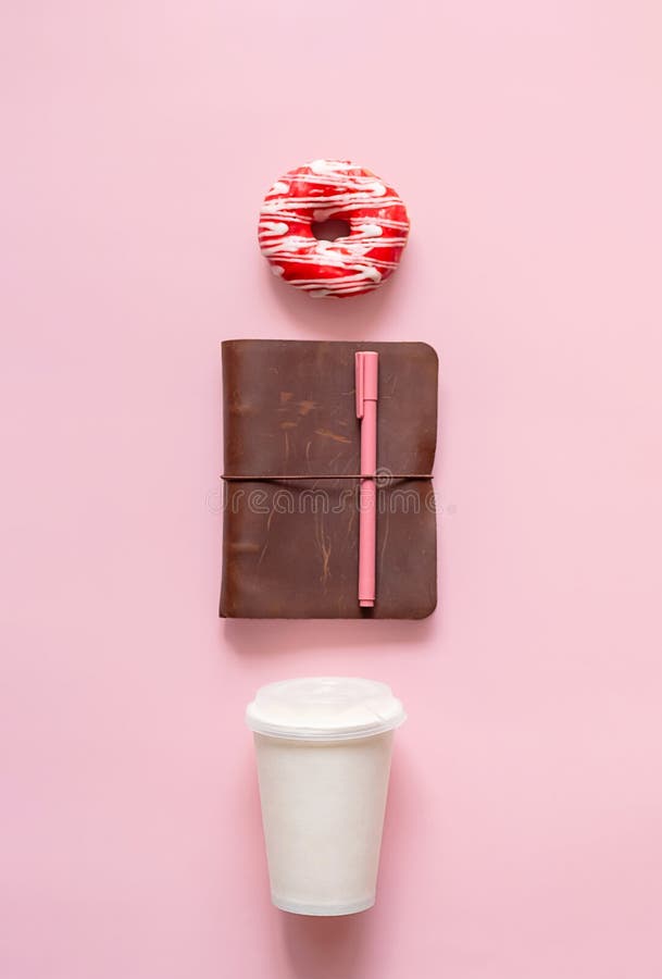Donut on Coffee Cup and Notebook with Pen. Morning Routine or Study ...