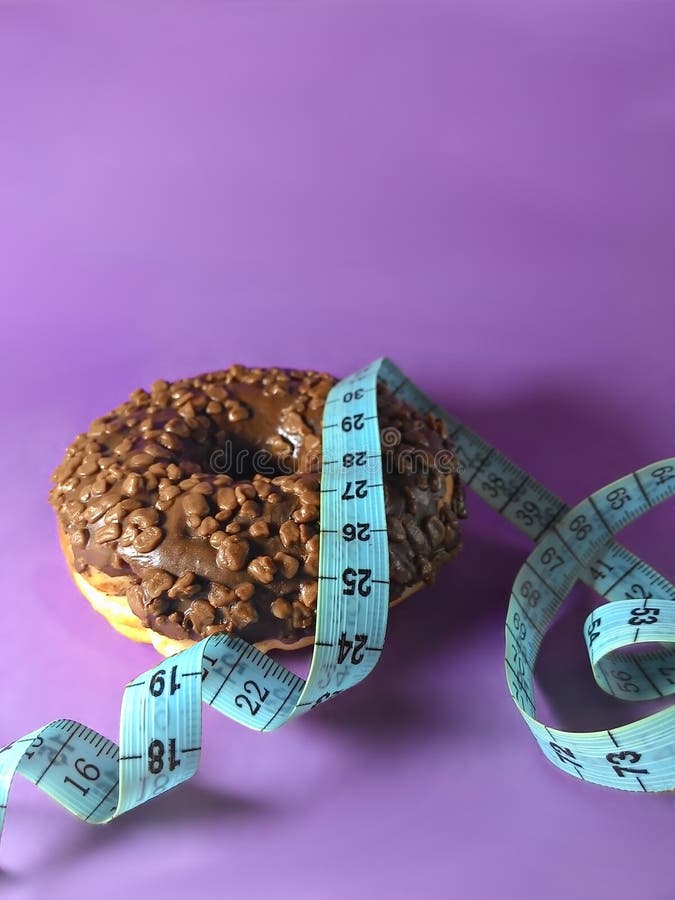 Donut diet stock photo. Image of icing, meter, fresh - 57200054