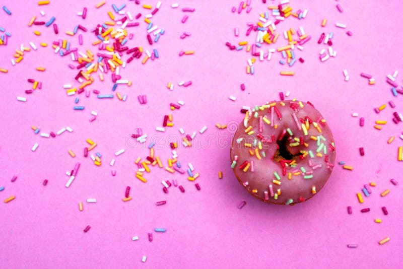 Donuts with Sprinkles on Pink Background. Sugar, Calories, Homemade ...