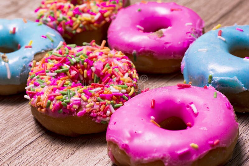 Donut Many Colors are Available on Wooden Floors Stock Image - Image of ...