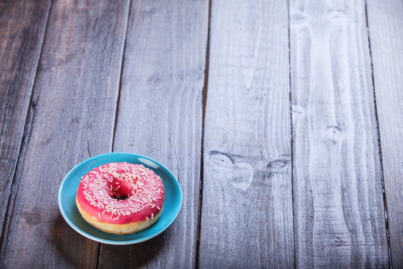 Donut on a table. stock photo. Image of food, pink, diet - 40825038