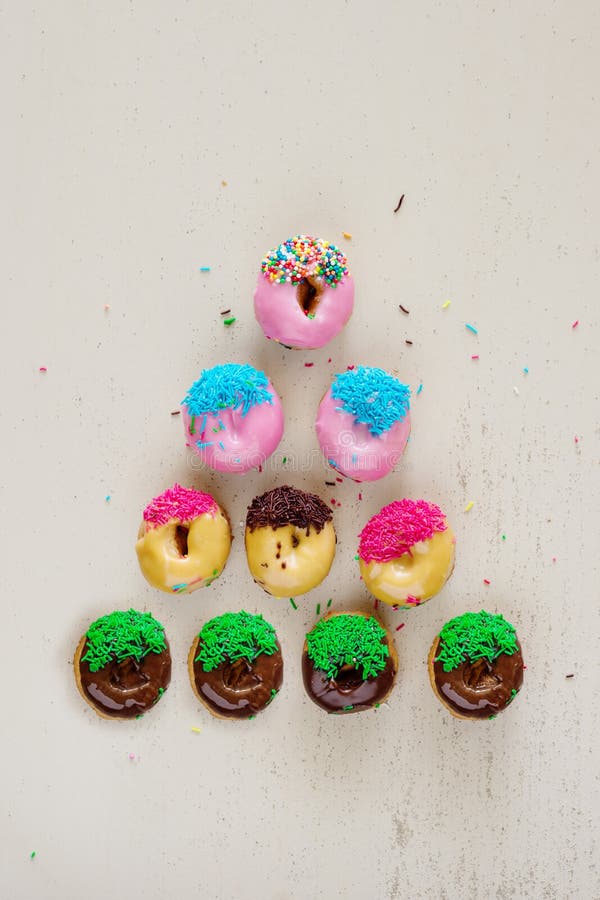 Mini Donuts in a Tree Shape Stock Photo - Image of junk, frosting ...