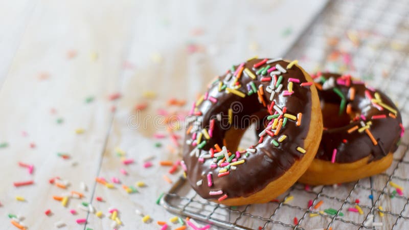 A donut on table stock image. Image of colorful, delicious - 179585999