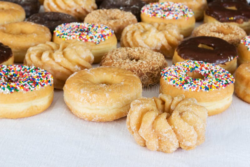 Lots of donuts in rows stock photo. Image of junk, food - 23036246