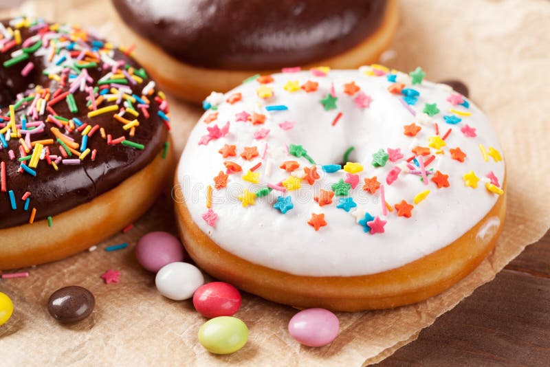 Donuts and candies stock photo. Image of beverage, donut - 67910538