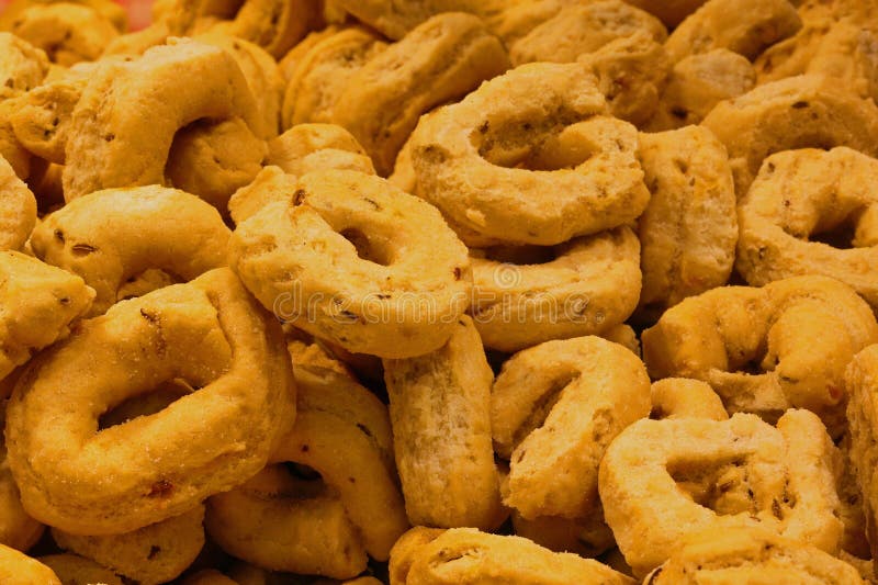 Donuts of Cooked Bread in Strips Called TARALLO or TARALLINO Typical of ...