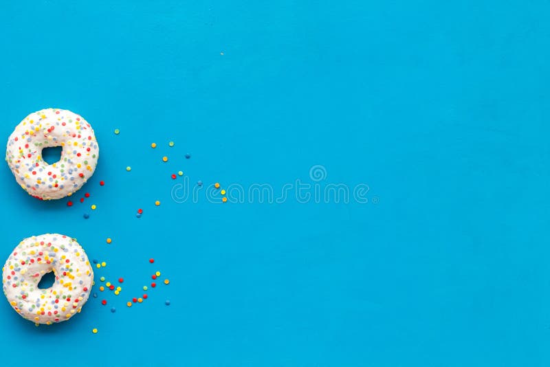 Donuts of Different Flavors for Breakfast on Blue Background Top View ...
