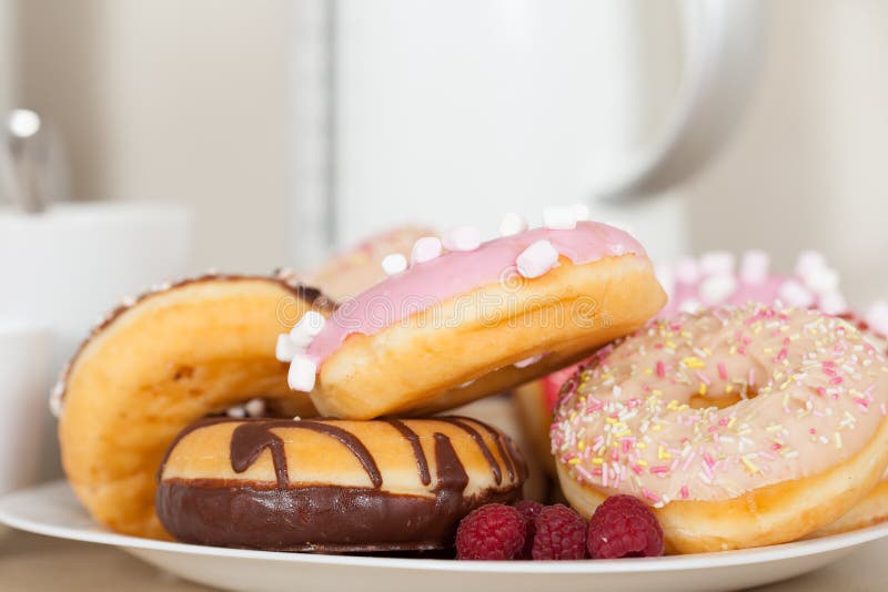 Donuts on plate stock photo. Image of plate, food, unhealthy - 53643486