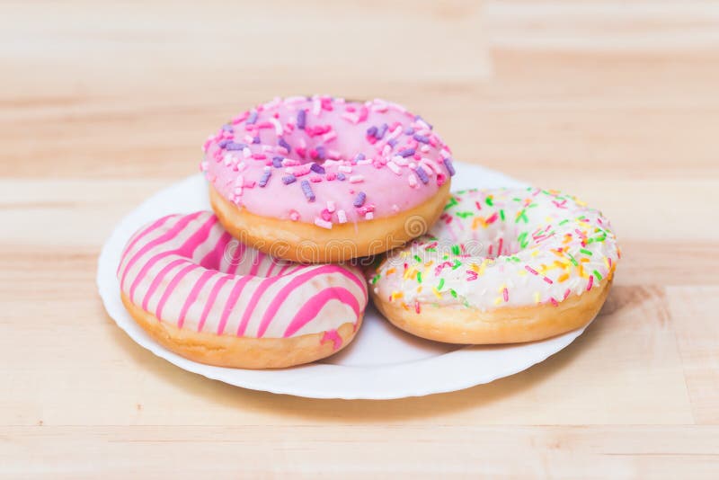 Donuts on a plate stock photo. Image of cooking, sweet - 96616500