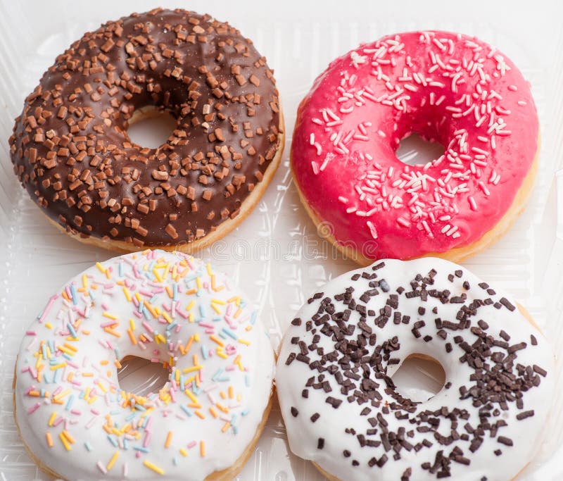 Donuts set in box on white stock image. Image of tasty - 86939325