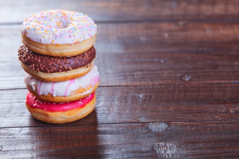 Donuts on a table. stock photo. Image of chocolate, break - 40825040