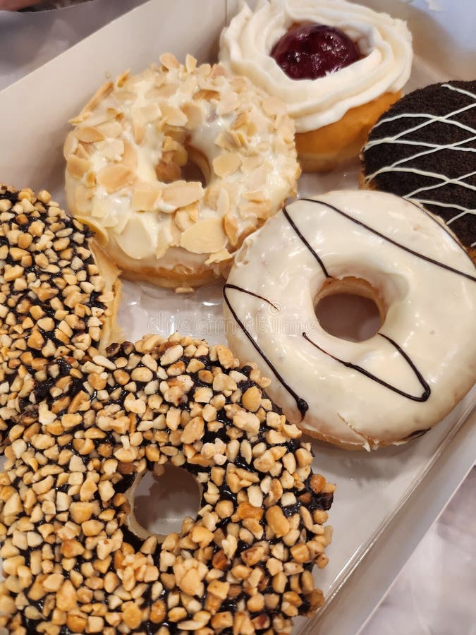Donuts with Various Toppings on Top Which Make Them Attractive and Look ...