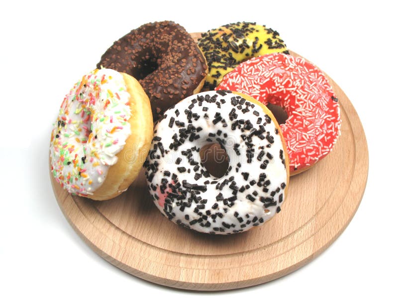 Donuts on wooden plate stock image. Image of donut, sweet - 6512013
