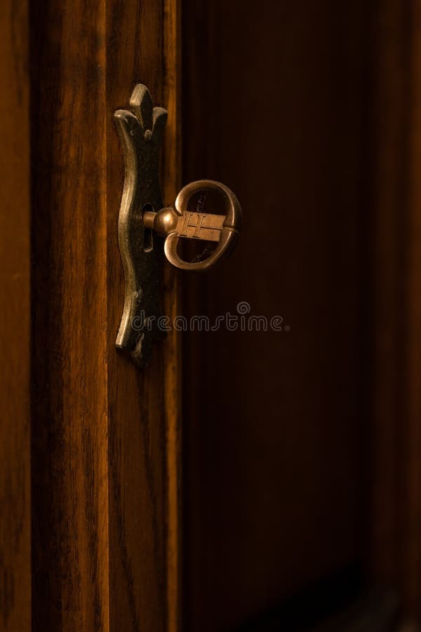 Detail of Dusty, Vintage Key in Keyhole on Antique Wood Door Stock ...