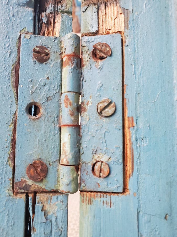 Door with blue hinge stock image. Image of brickwork - 284393357