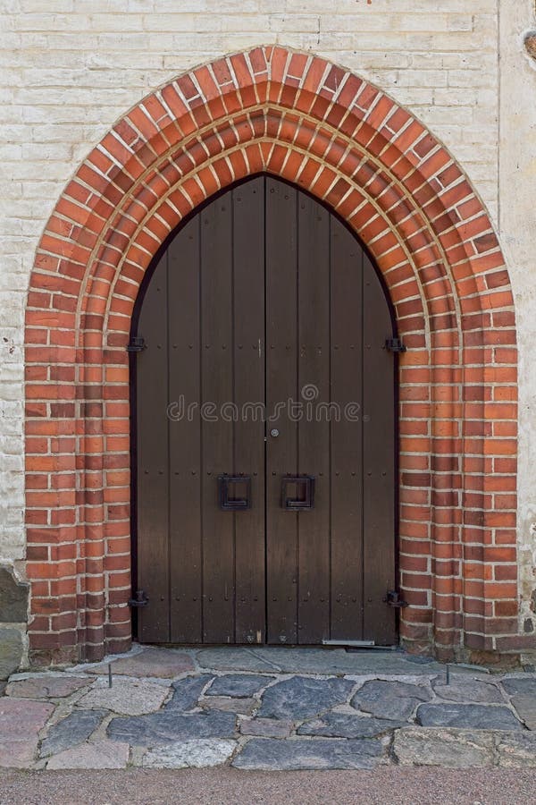 Door on brick wall. stock photo. Image of style, wooden - 324423324