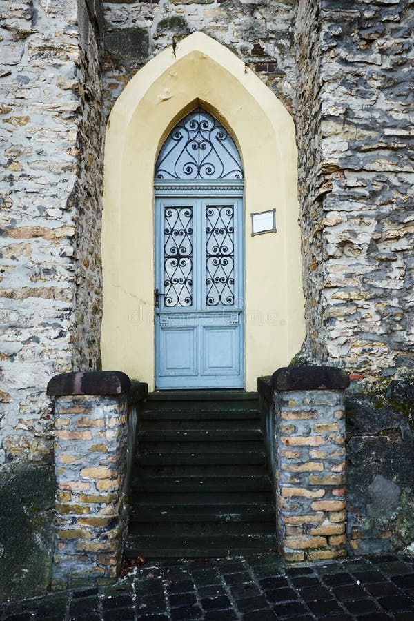 Door on building facade stock photo. Image of color - 132678832