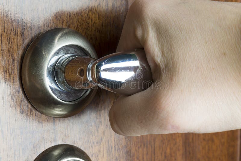 Door with a hand on handle stock photo. Image of design - 88904322