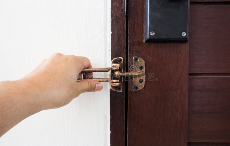 Door with a hand on handle stock image. Image of handle - 111779065