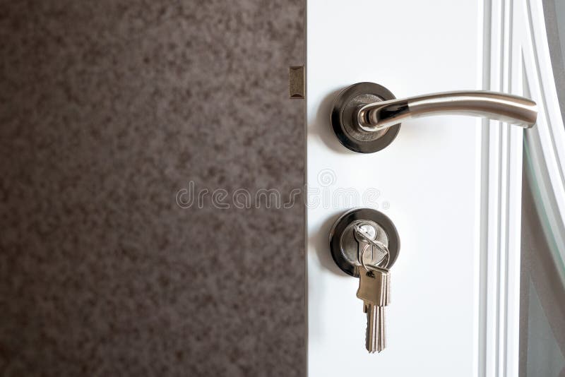 Door Handle and Keyhole with Bunch of Keys Stock Image - Image of ...