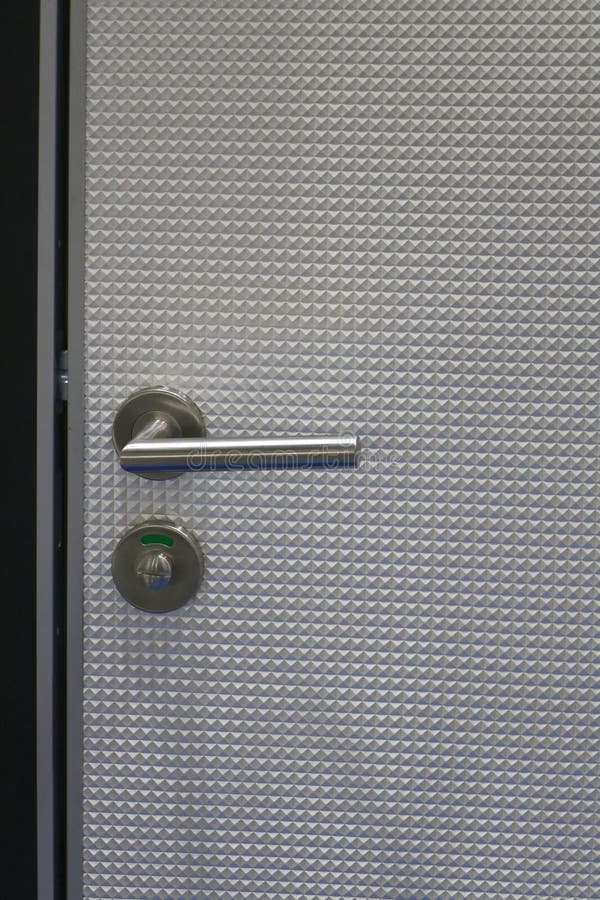 Door handle on metal door stock photo. Image of door - 147901948