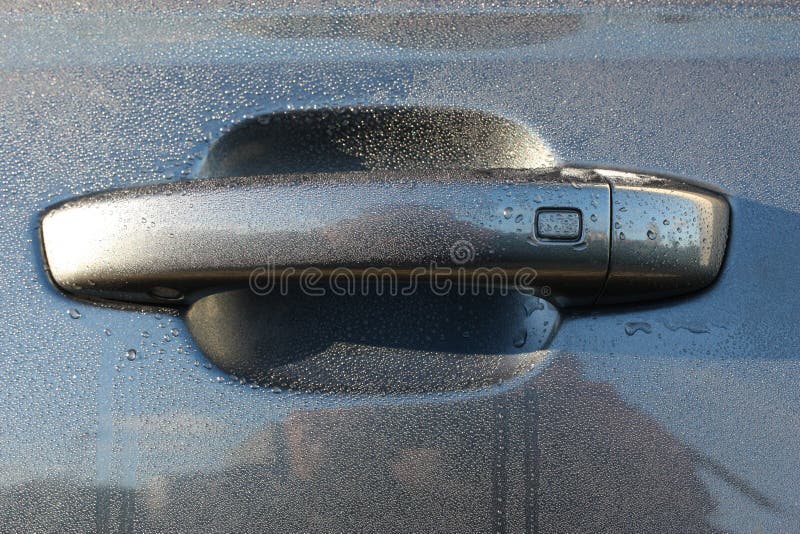 Door Handle of Modern Gray (Daytona Gray Pearl Effect) Car with Keyless ...