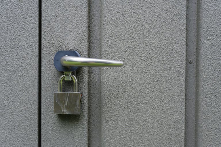 A Door Handle with Padlock stock image. Image of problem - 395235683