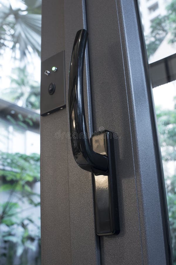A Door Handle with a Screen Sensor Installed on a Sliding Door at an ...