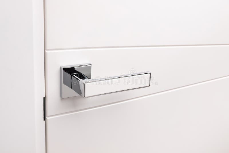 Door Handle on White Closed Doors in Modern Loft Style in Interior ...