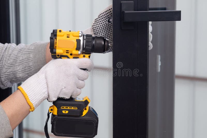 Door hardware installation stock image. Image of drilling - 366878469