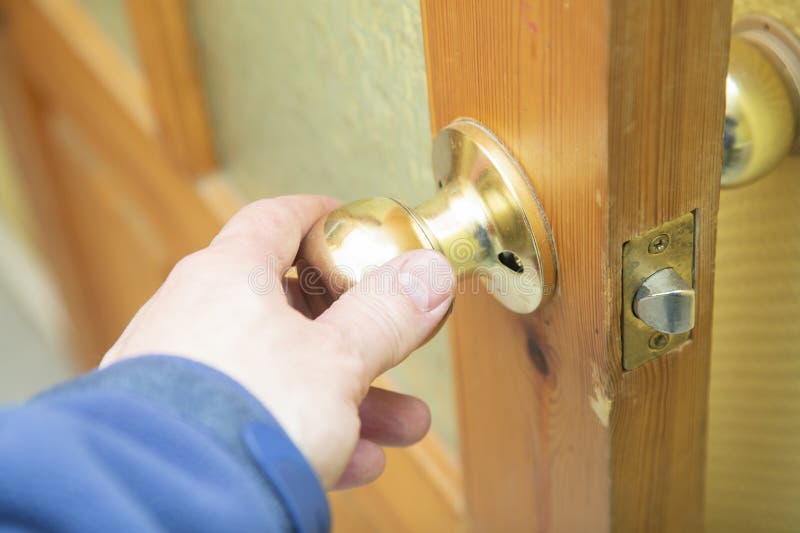 Door Interior Locks .Installing Locks on the Door Stock Photo - Image ...