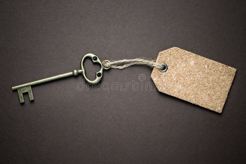 Door key and blank label stock photo. Image of plain - 98701408