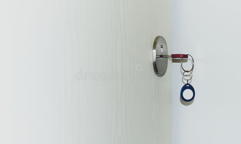 Door key with keychain stock photo. Image of hand, real - 256433090