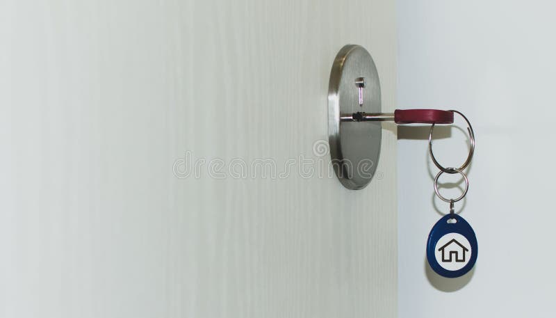 Door key with keychain stock image. Image of 2023, hand - 257561341
