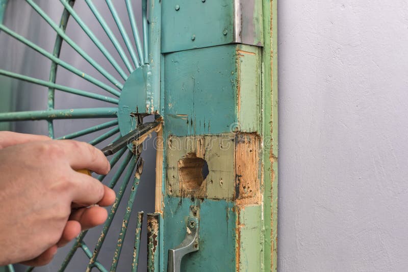Door lock installation stock photo. Image of background - 382161570