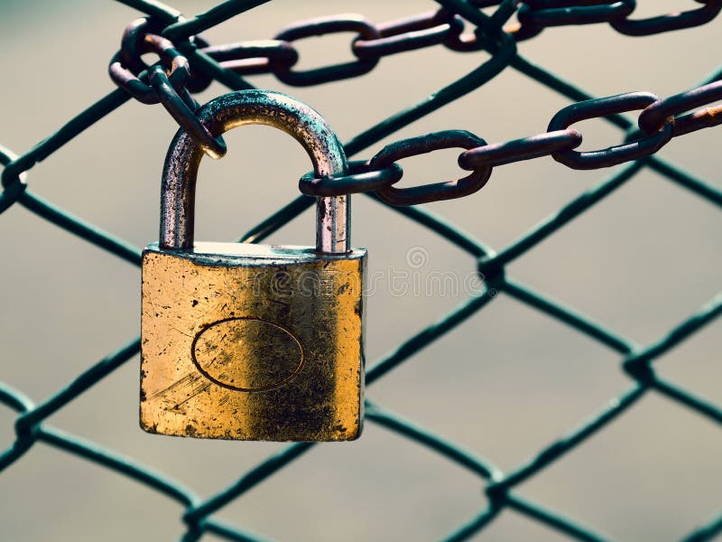 Door Lock on the Iron Gate with Iron Chain and Padlock Stock Photo ...