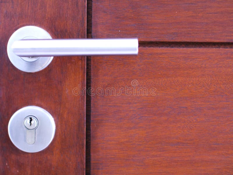 Door lock key with handle. stock photo. Image of cabinetry - 334267446