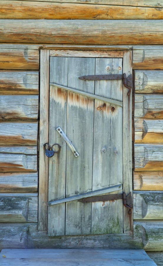 Door is Locked in an Old Wooden Hut. Iron Lock, Old Rusty Door Hinges ...