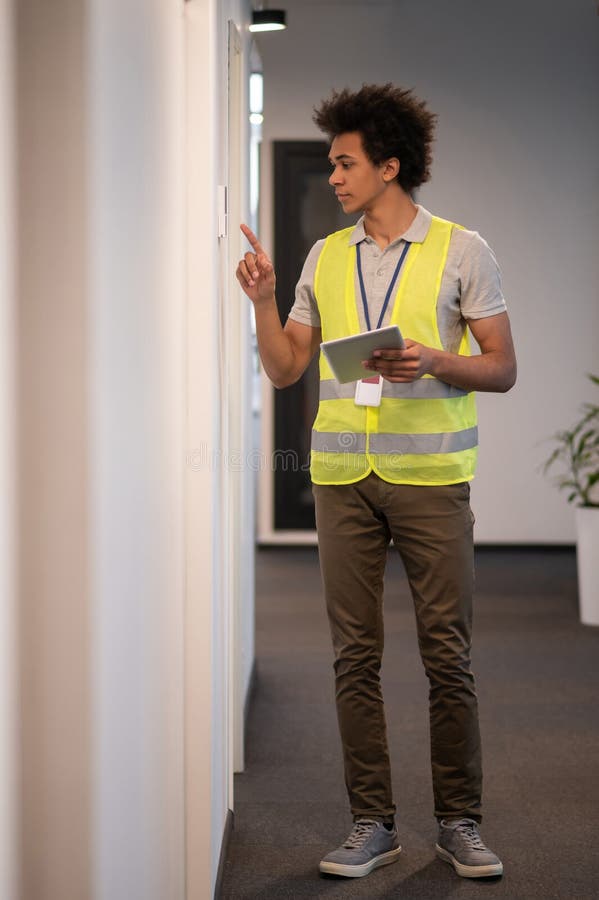 Service Man Checking the Sensor Door Locker and Looking Involved Stock ...