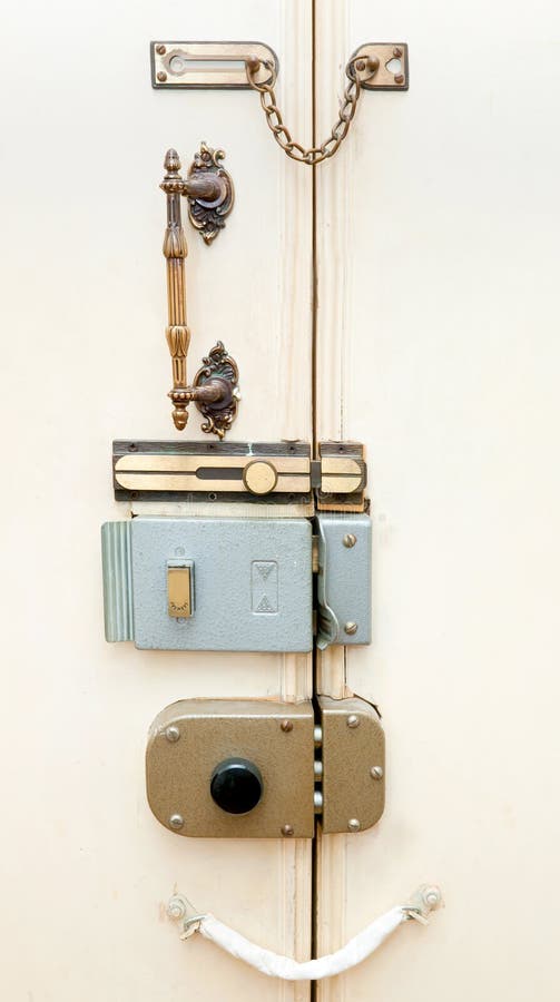 Door with Many Different Locks Stock Photo - Image of thieves, safety ...