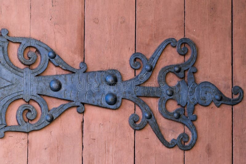 Door hinge on a door stock image. Image of gothic, iron - 365509971