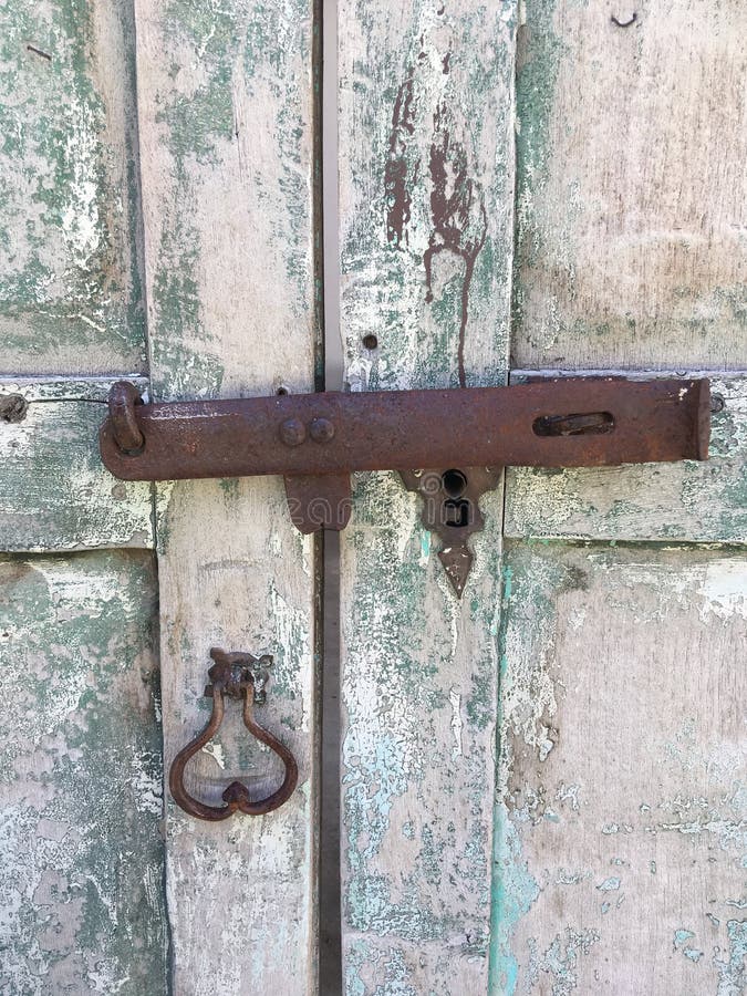 Door with old hardware stock photo. Image of antique - 176292142