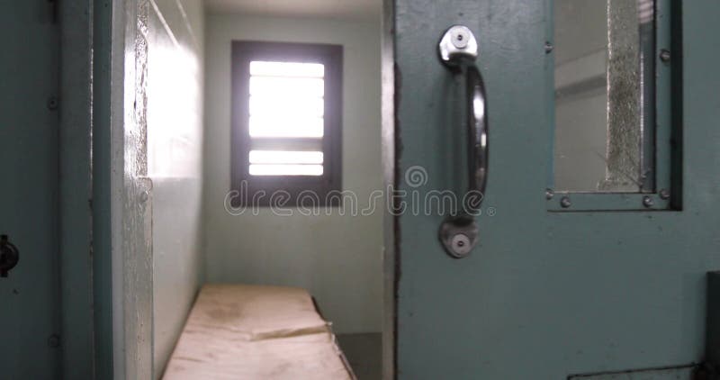 Door opening on jail cell stock footage. Video of slide - 199931268