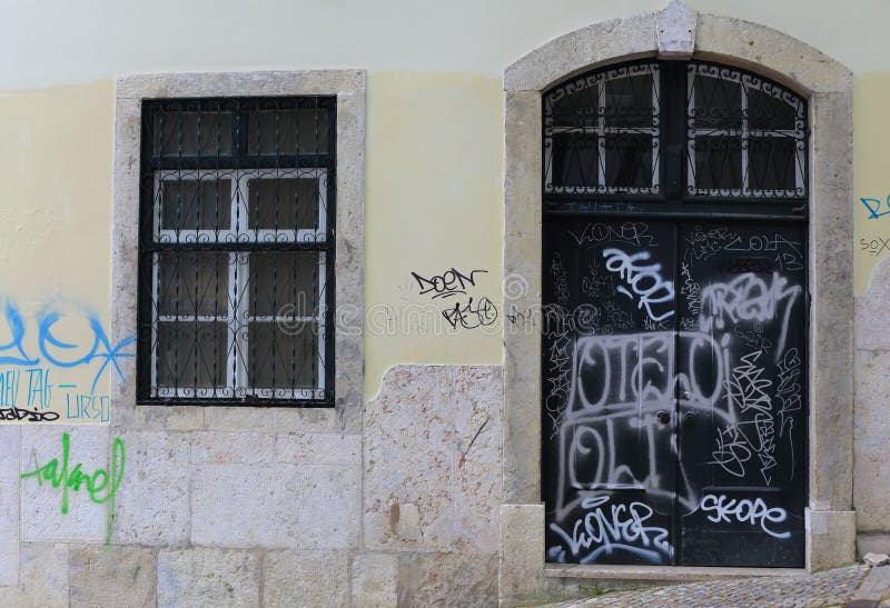 Door and Window with Graffiti Stock Photo - Image of wall, portugal ...