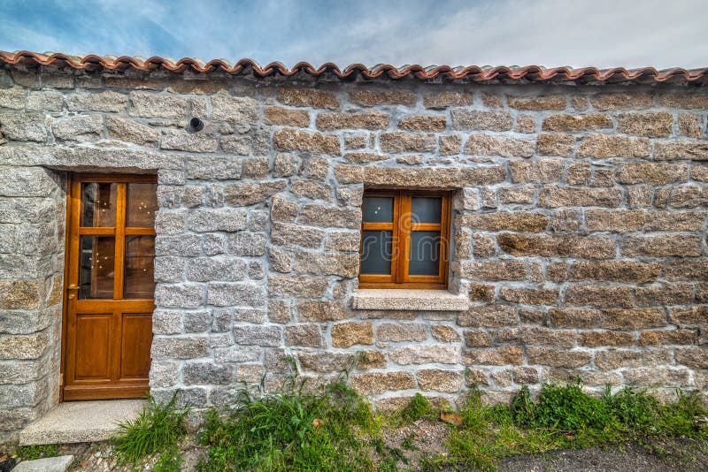 Door and Window in a Rustic Wall Stock Image - Image of external ...