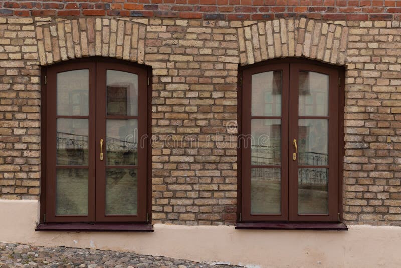 Door and Window on the Wall of a Wooden and Stone House Stock Photo ...
