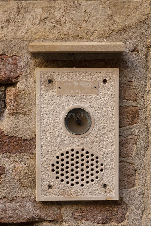 Doorbell Button and an Intercom Speaker Mounted on an Exterior Wall of ...