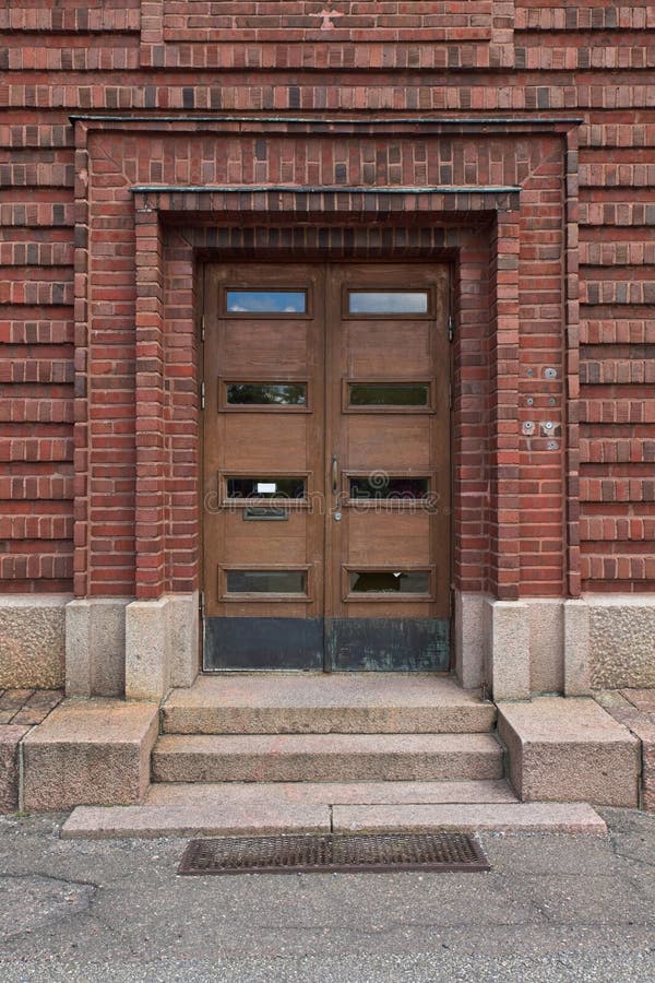 Doors on brick building. stock image. Image of detail - 313391097